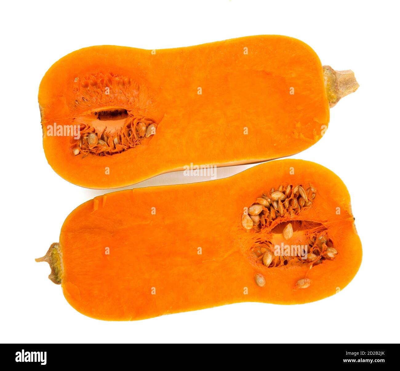 Butternut ready to cook cut in half on white background Stock Photo - Alamy