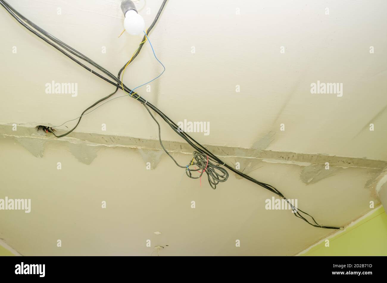 Wires on the ceiling, preparation for installation of a stretch ceiling ...