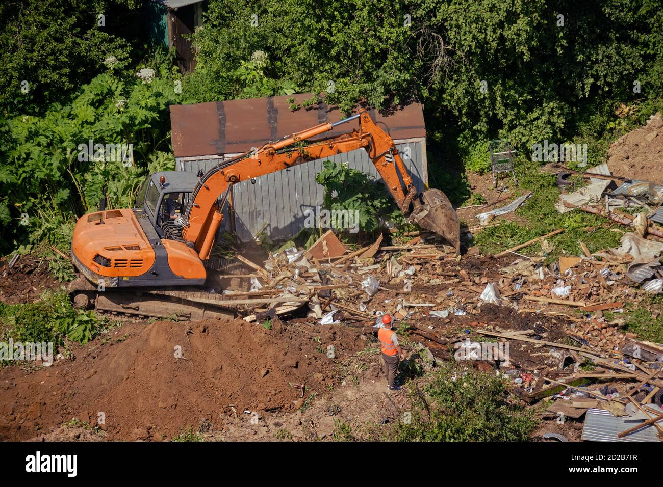 Bulldozer tree buildings hi-res stock photography and images - Alamy