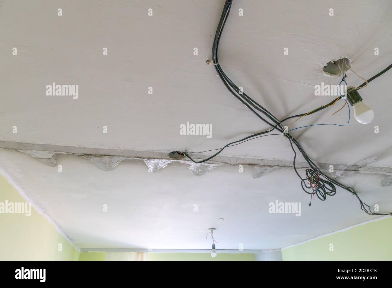Wires on the ceiling, preparation for installation of a stretch ceiling ...
