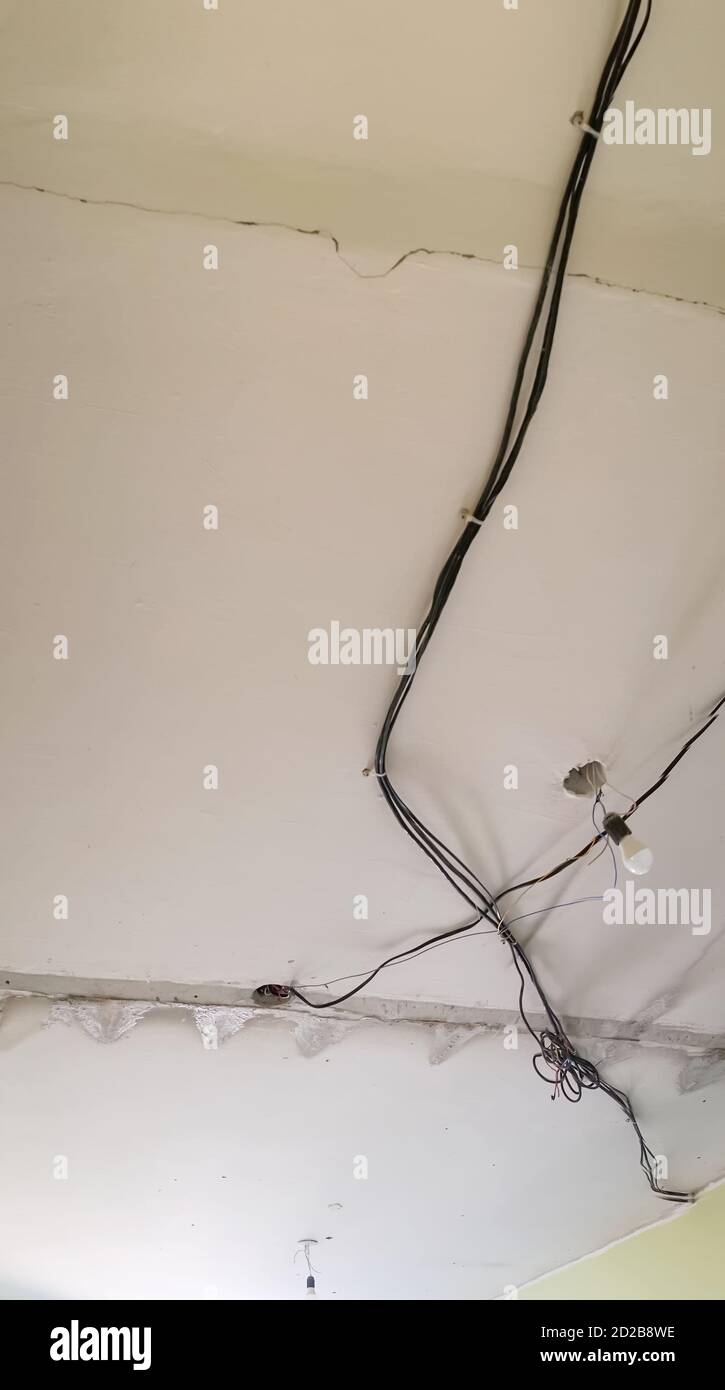 Wires on the ceiling, preparation for installation of a stretch ceiling ...
