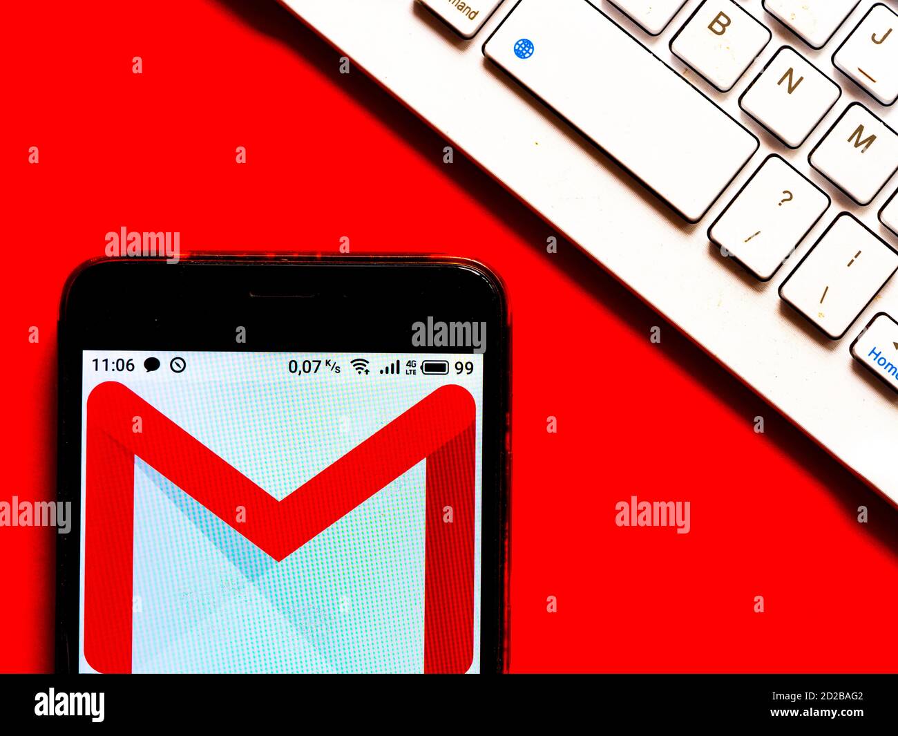 In this photo illustration a Gmail logo seen displayed on a smartphone ...