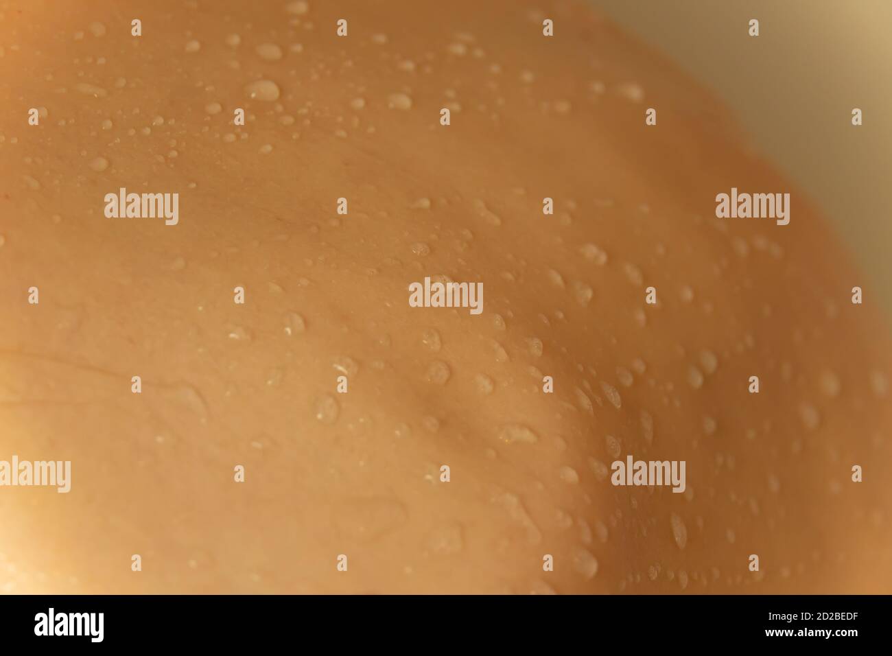 Water drops on human skin in macro photography, background Stock Photo ...