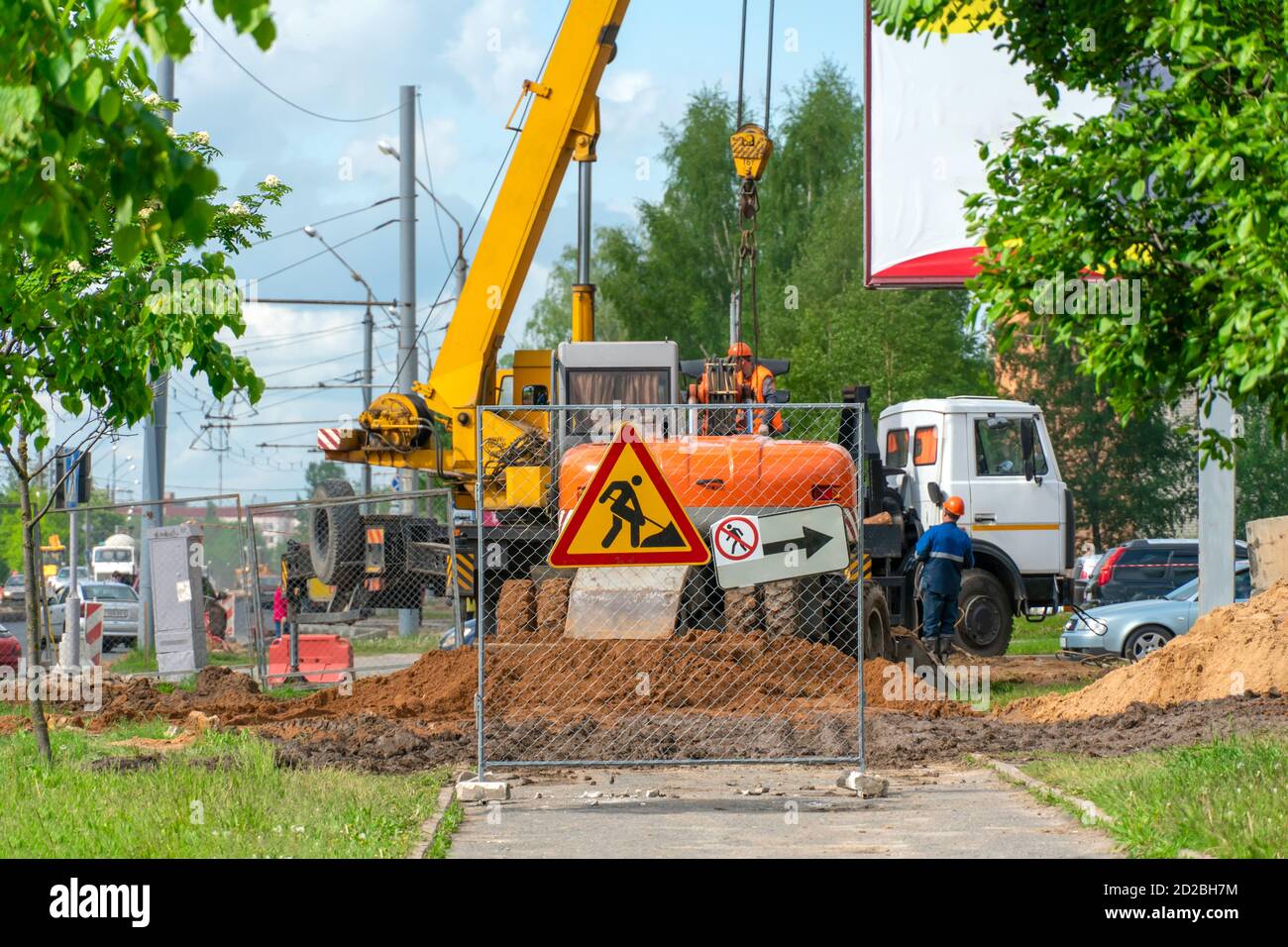 Repair work on sidewalks in the city on a Sunny bright summer day ...