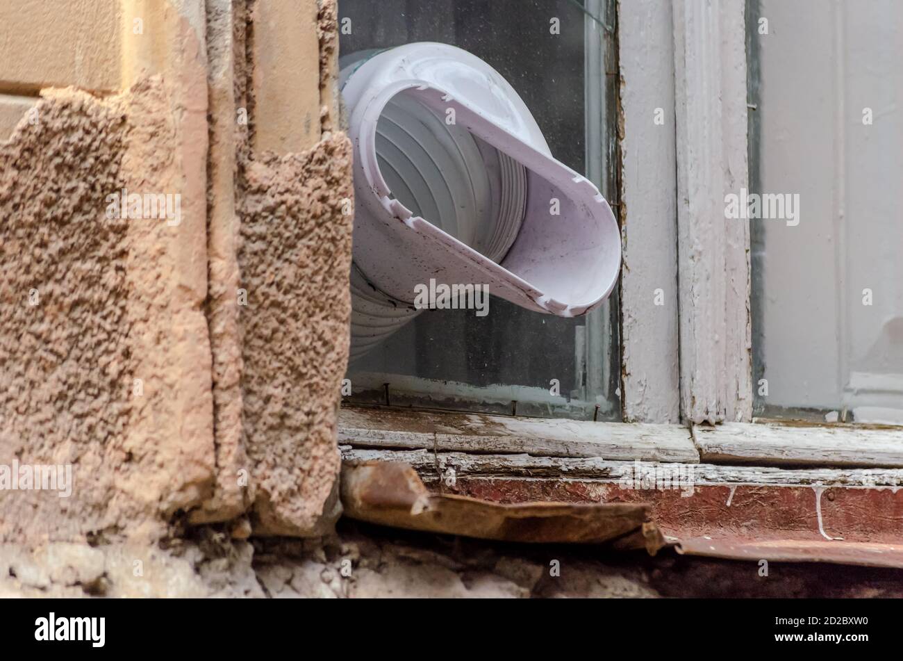 Plastic pipe for ventilation sticking out of the window close-up Stock ...