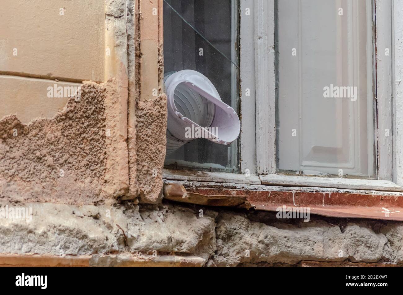Plastic pipe for ventilation sticking out of the window close-up Stock ...