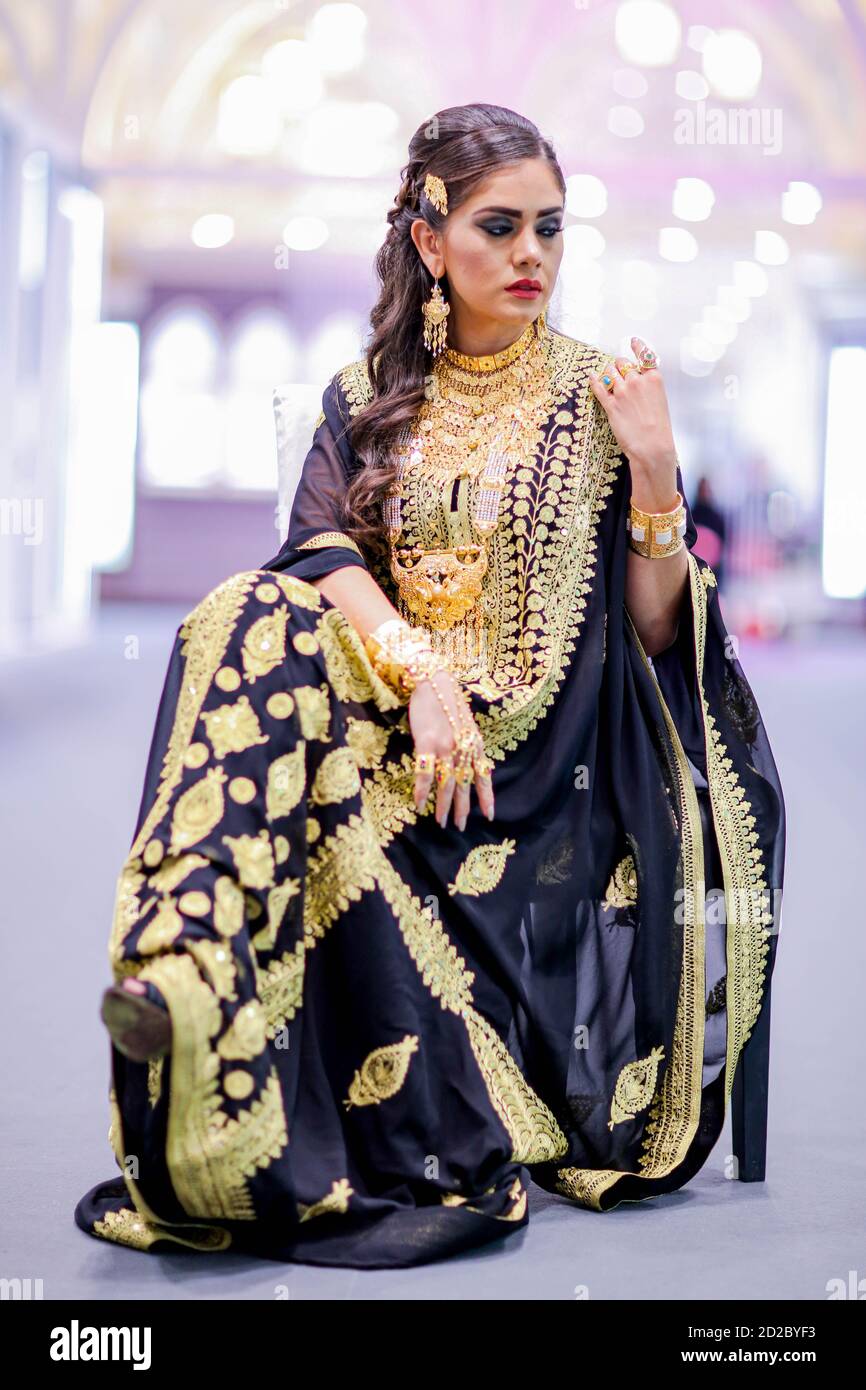 Arab Female in traditional dress with traditional jewelry Stock Photo ...