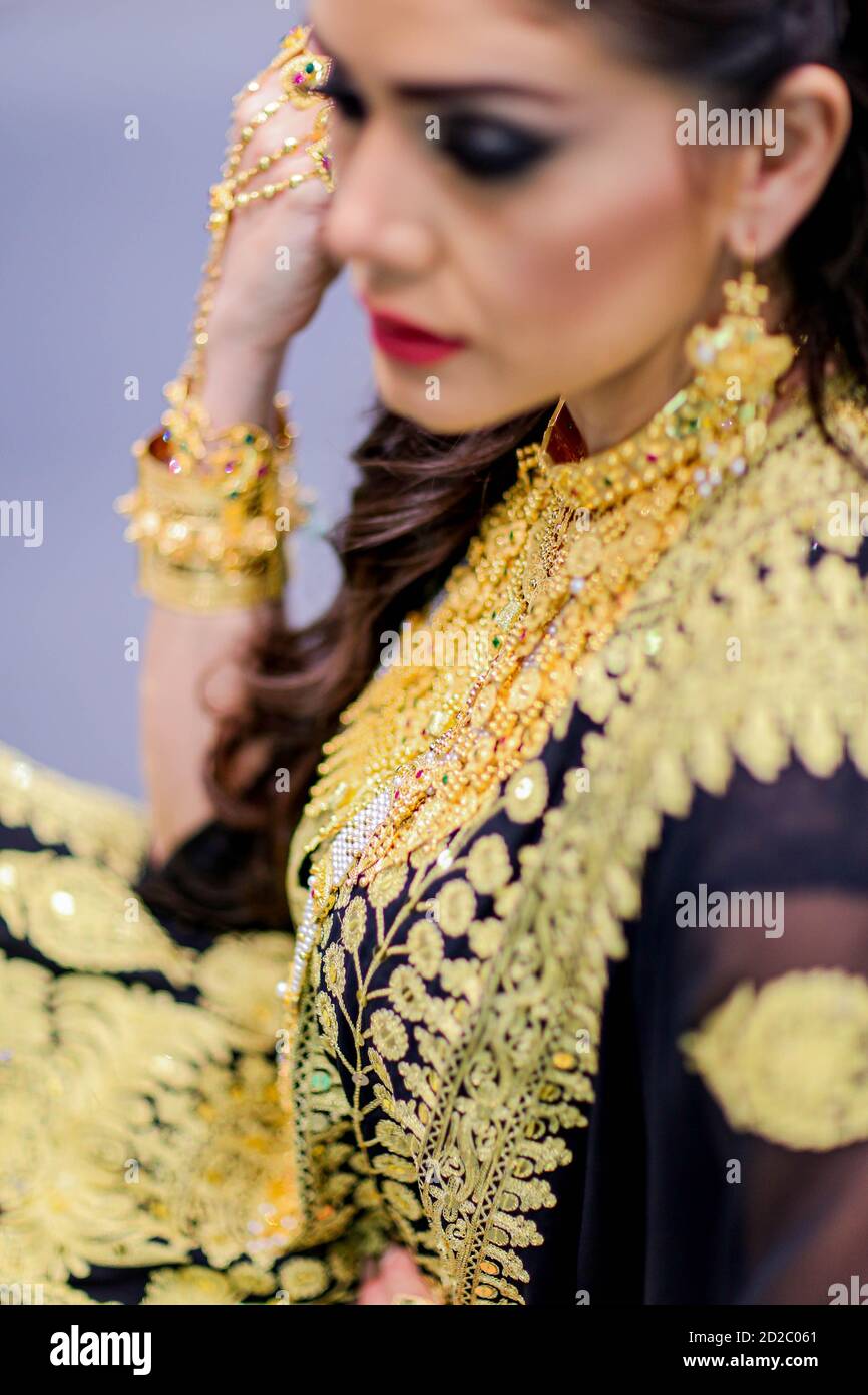 Arab Female in traditional dress with traditional jewelry Stock Photo ...