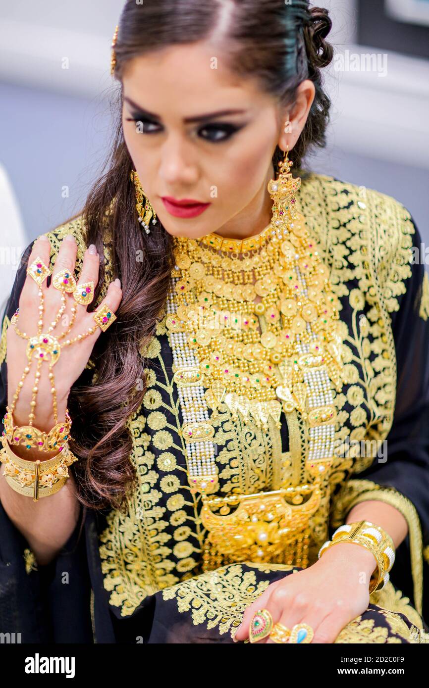 Arab Female in traditional dress with traditional jewelry Stock Photo ...