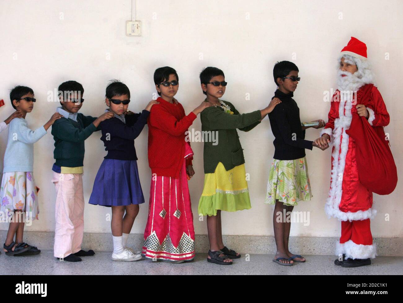 Indian people dressed santa claus hi-res stock photography and images ...