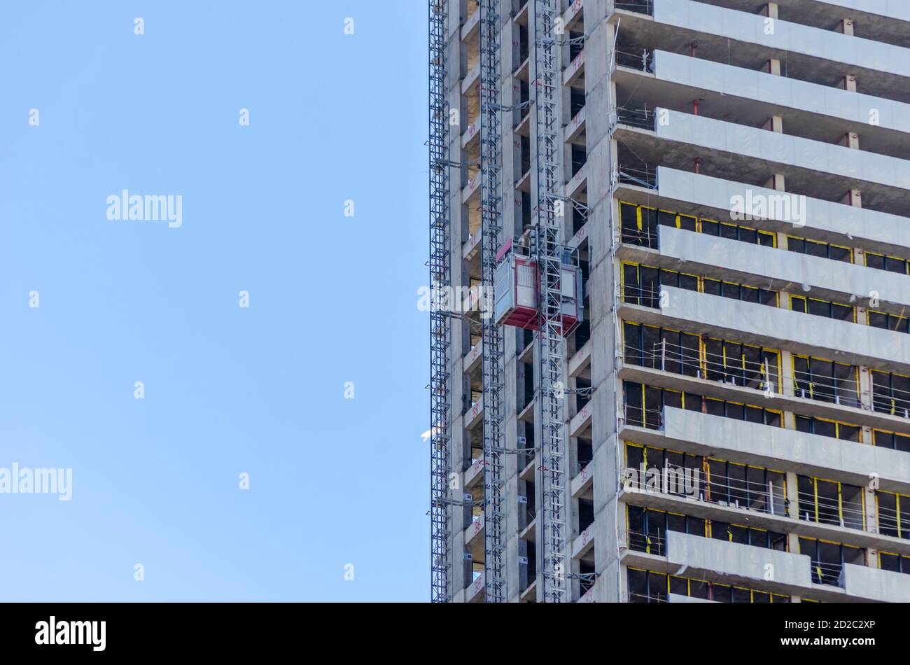 Construction of a multi-storey residential building. Lifting freight ...