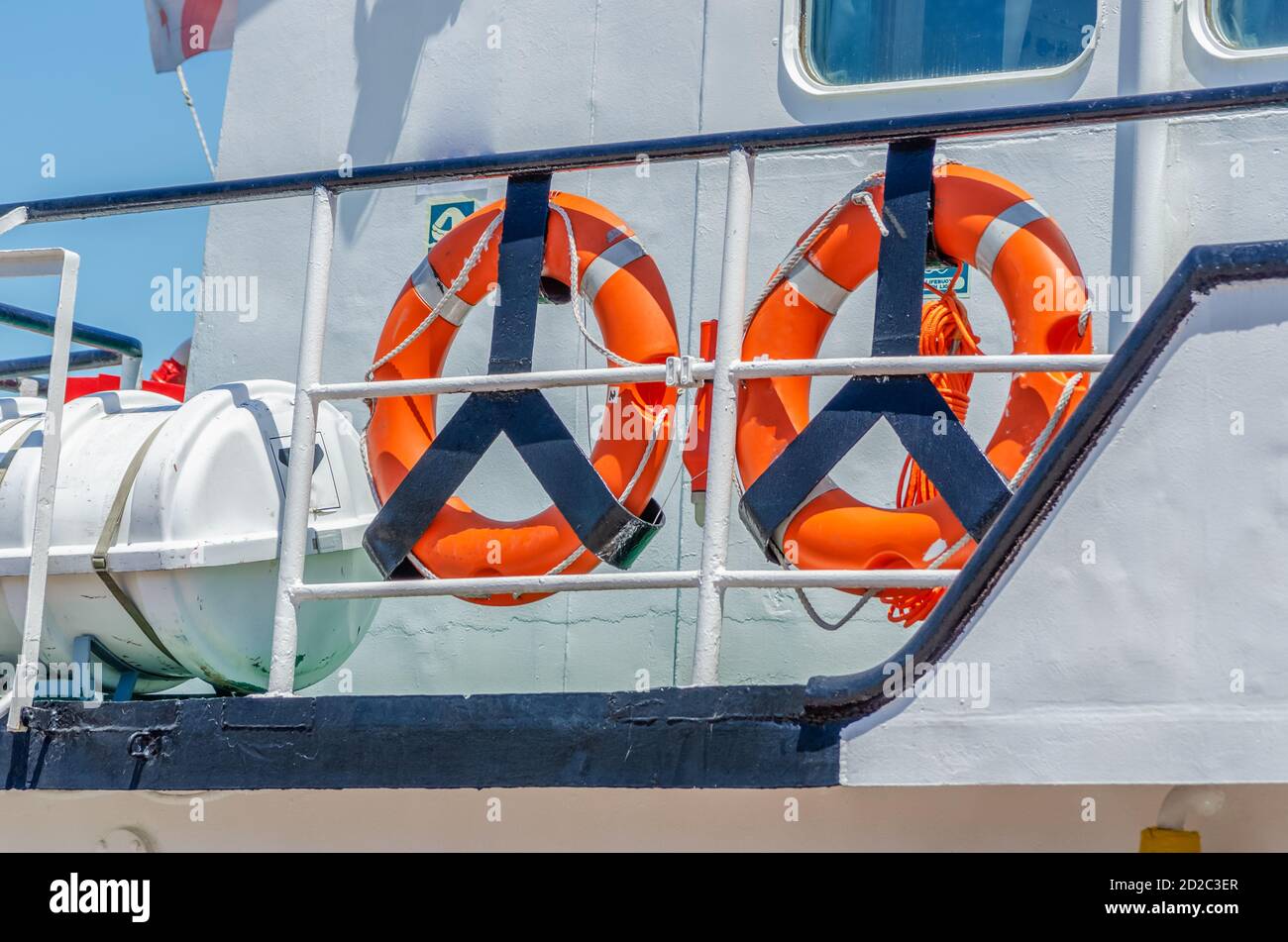 two lifebuoys on a ship on a sunny day Stock Photo - Alamy