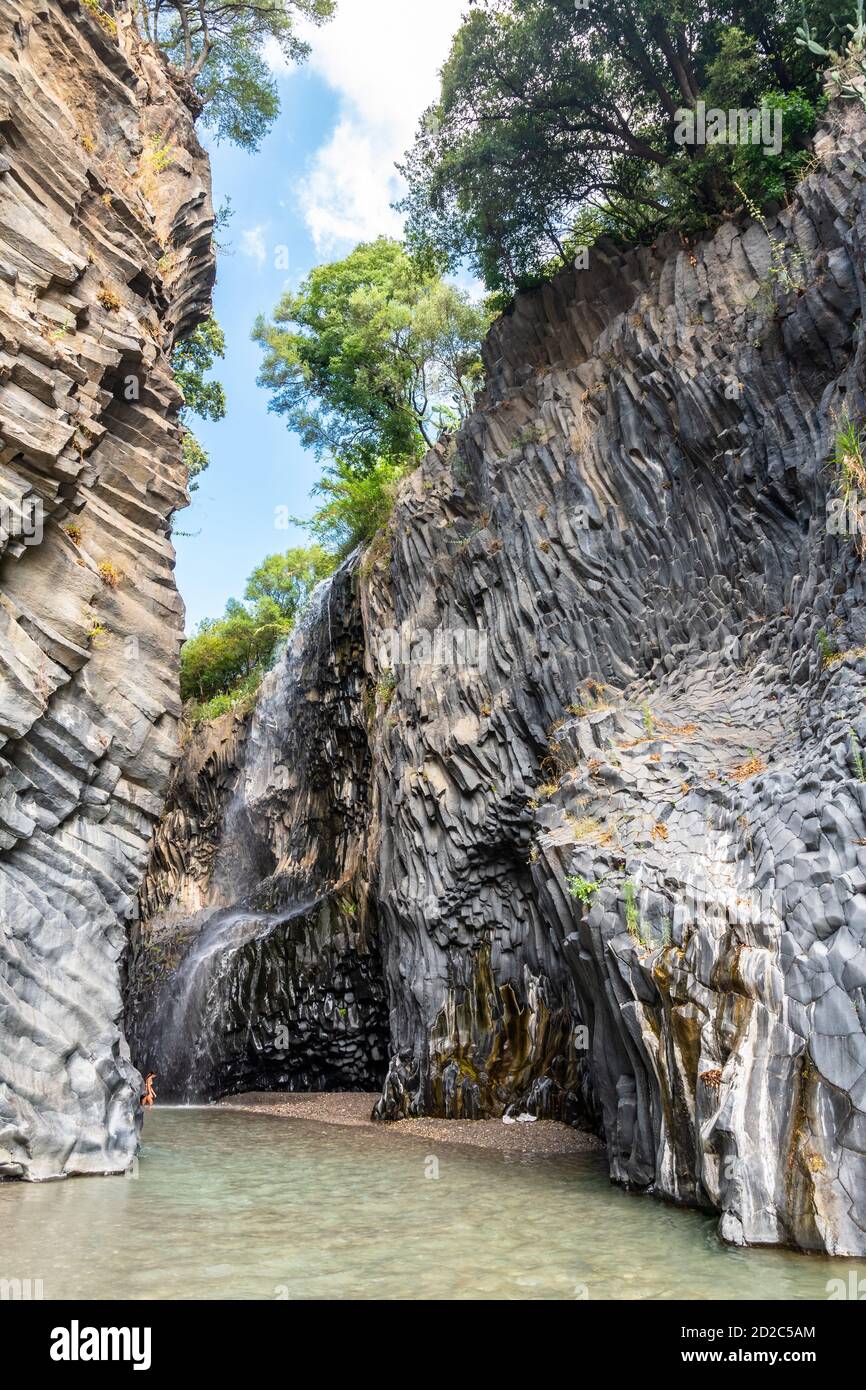 Basalt rocks and pristine water of Alcantara gorges in Sicily, Italy ...