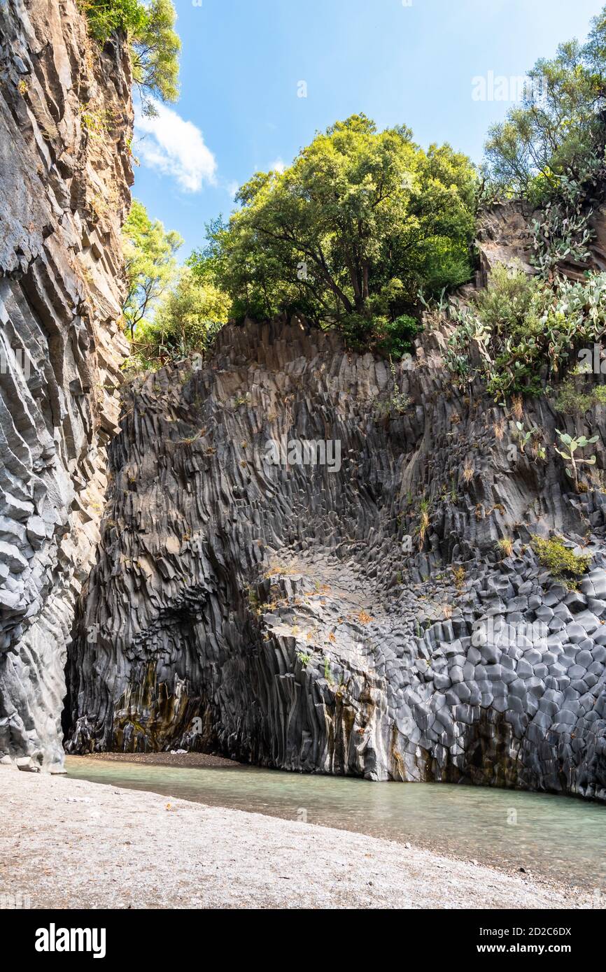 Basalt rocks and pristine water of Alcantara gorges in Sicily, Italy ...