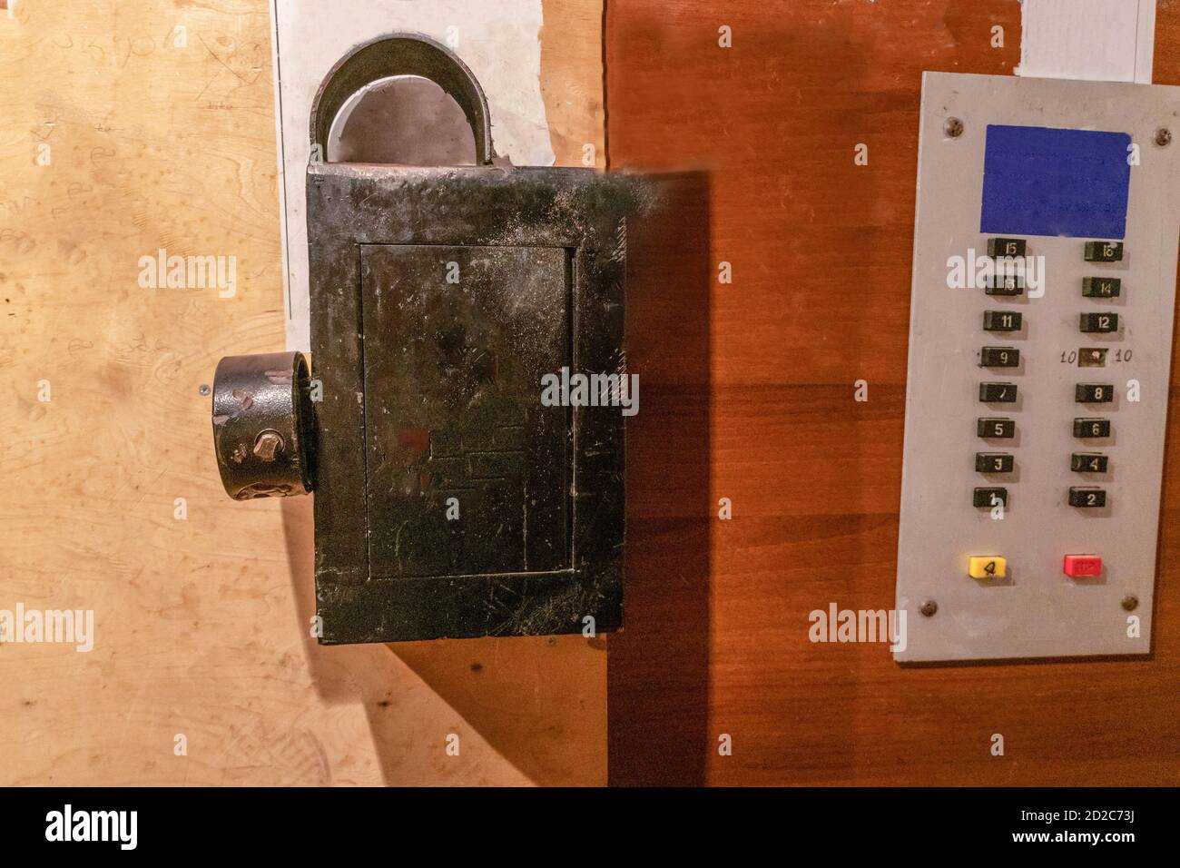 elevator with old buttons and coin receiver for elevator operation ...