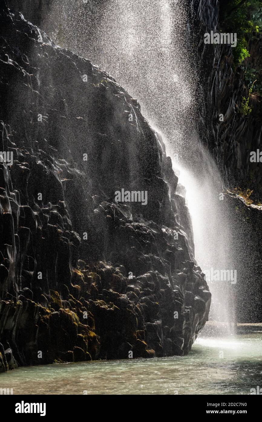 Basalt rocks and pristine water of Alcantara gorges in Sicily, Italy ...