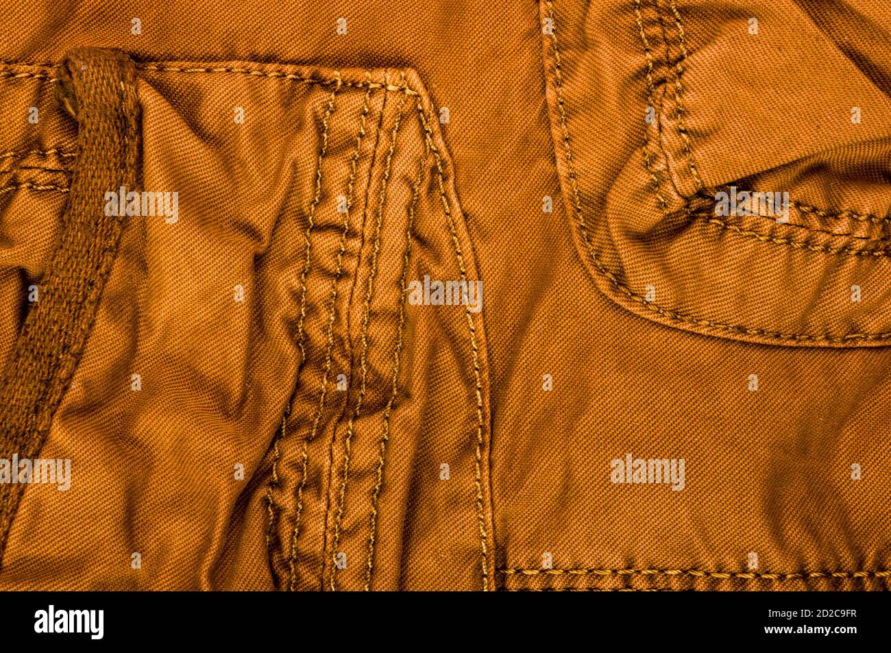clothing items stonewashed cotton fabric texture with seams, clasps ...