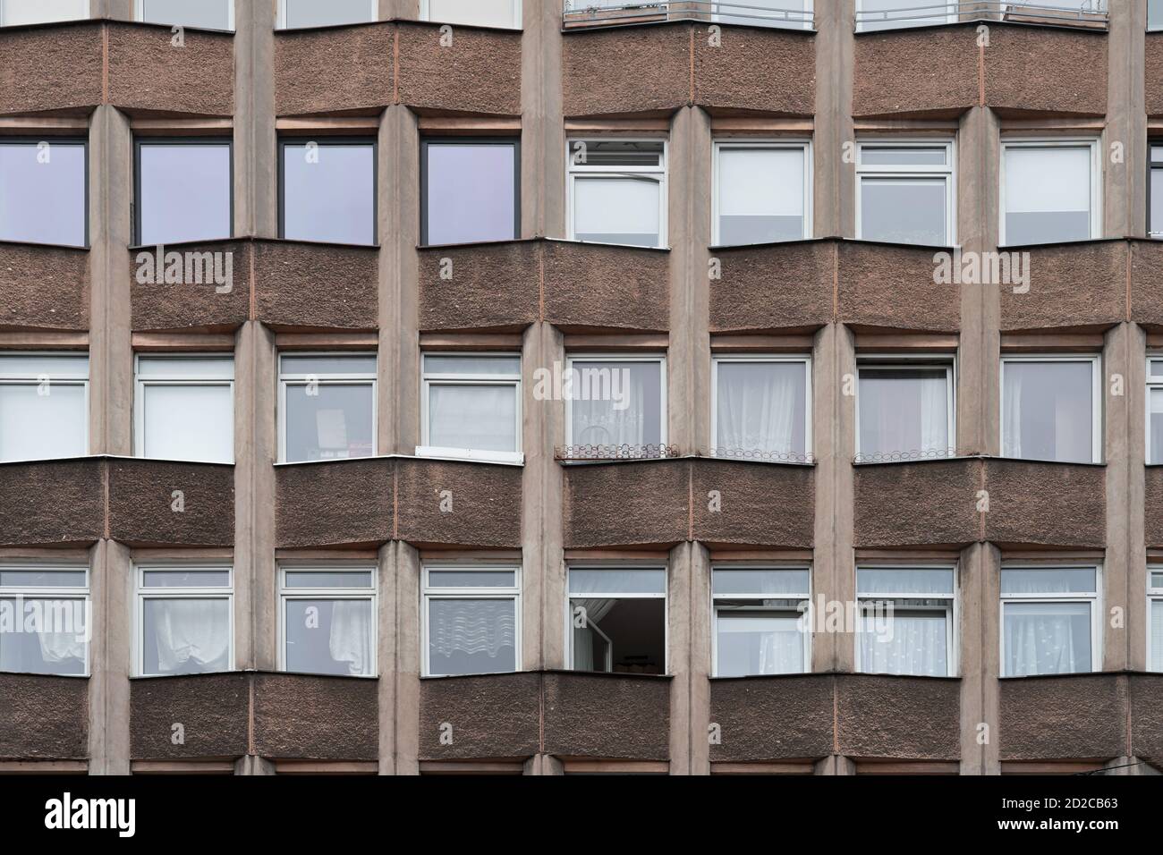 Old residential building facade with one window open. Architectural ...