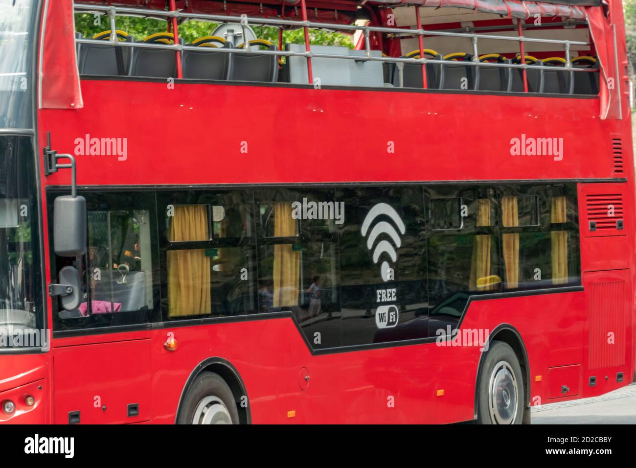 Free Wi-Fi symbol or sign on a red double-decker tourist bus Stock ...