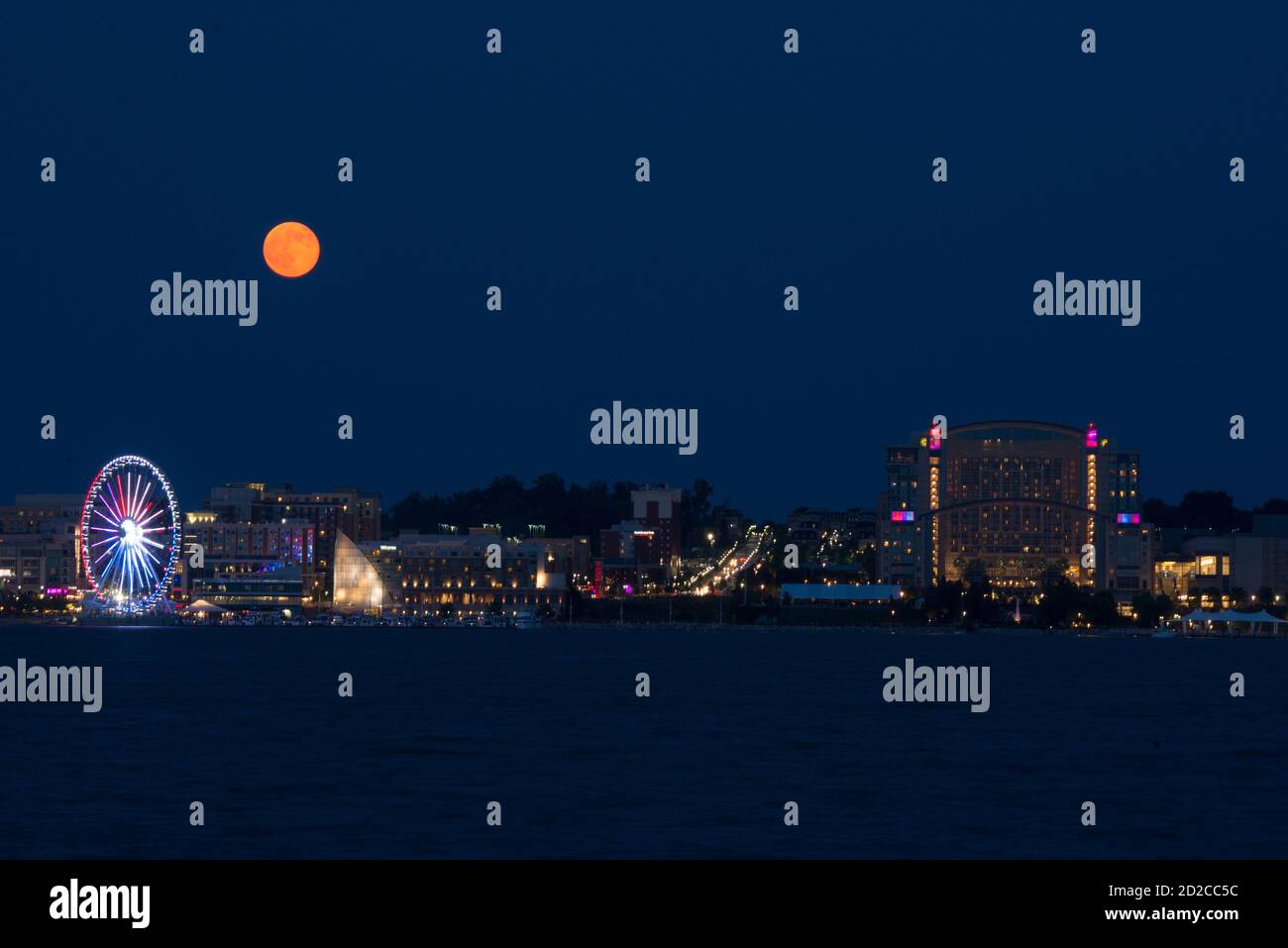 Super-moonrise at National Harbor in Maryland across the Potomac River ...