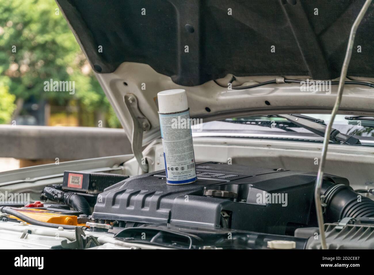 On the motor of the car is spray. The concept of repair, cleaning the ...