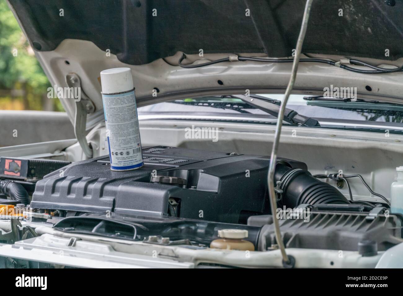 On the motor of the car is spray. The concept of repair, cleaning the ...