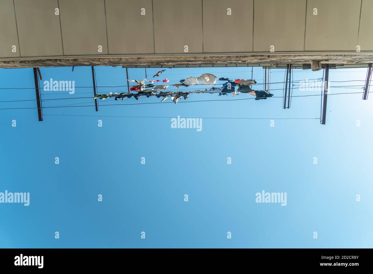 Drying clothes on a clothesline, drying things in the street on the ...