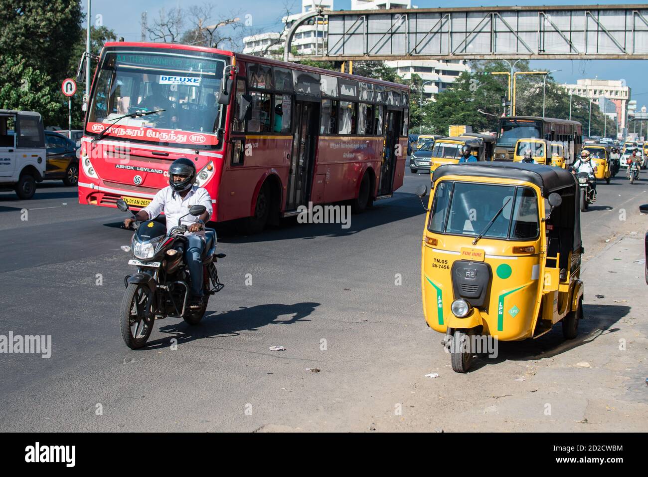Chennai, India - February 6, 2020: Traffic with public transport buses ...