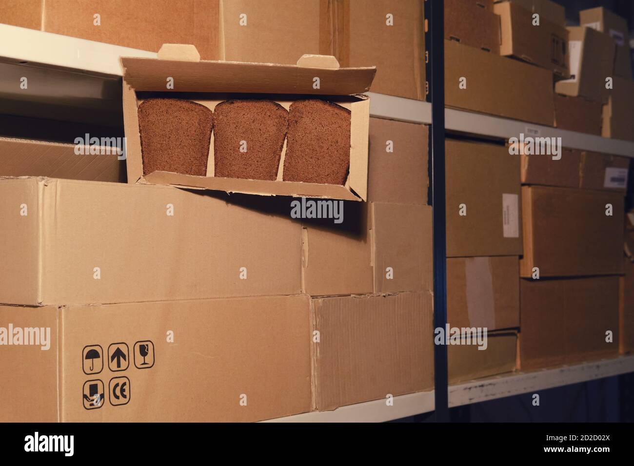 Stealing bread in a warehouse during a lockdown. Empty warehouse with ...
