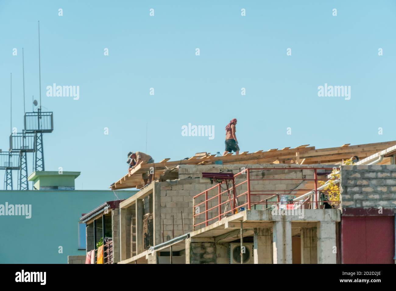 Home construction. House construction workers Stock Photo - Alamy
