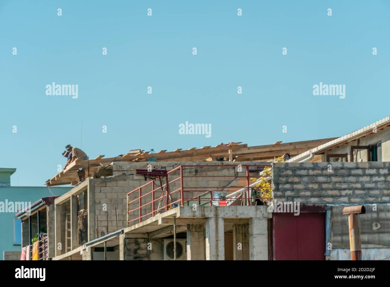 Home construction. House construction workers Stock Photo - Alamy