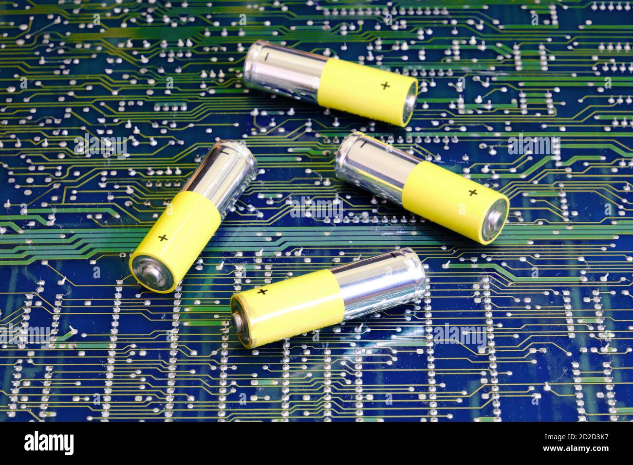 Finger batteries against electronic circuit board Stock Photo - Alamy