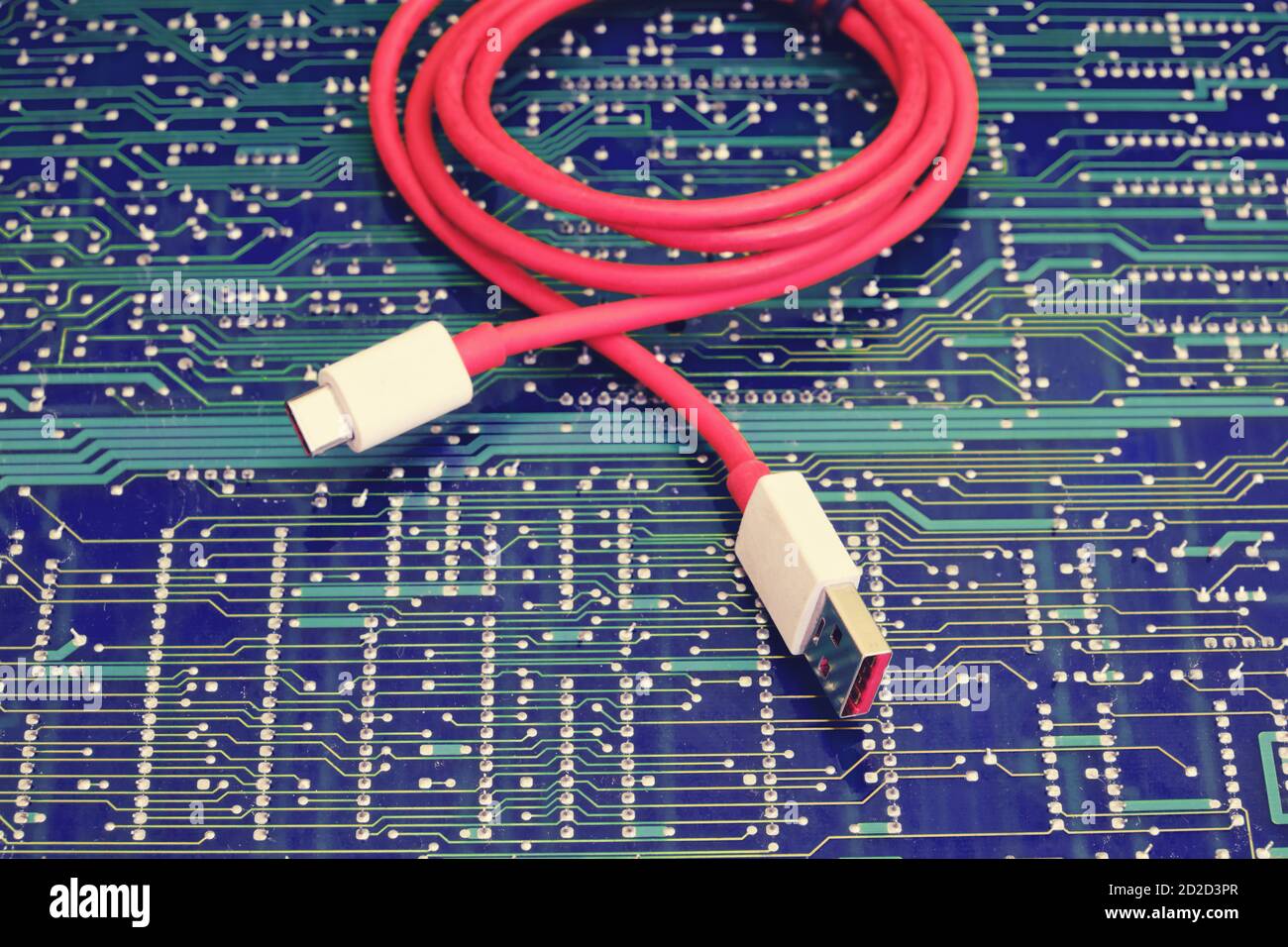 Red usb wire against electronic circuit board Stock Photo - Alamy