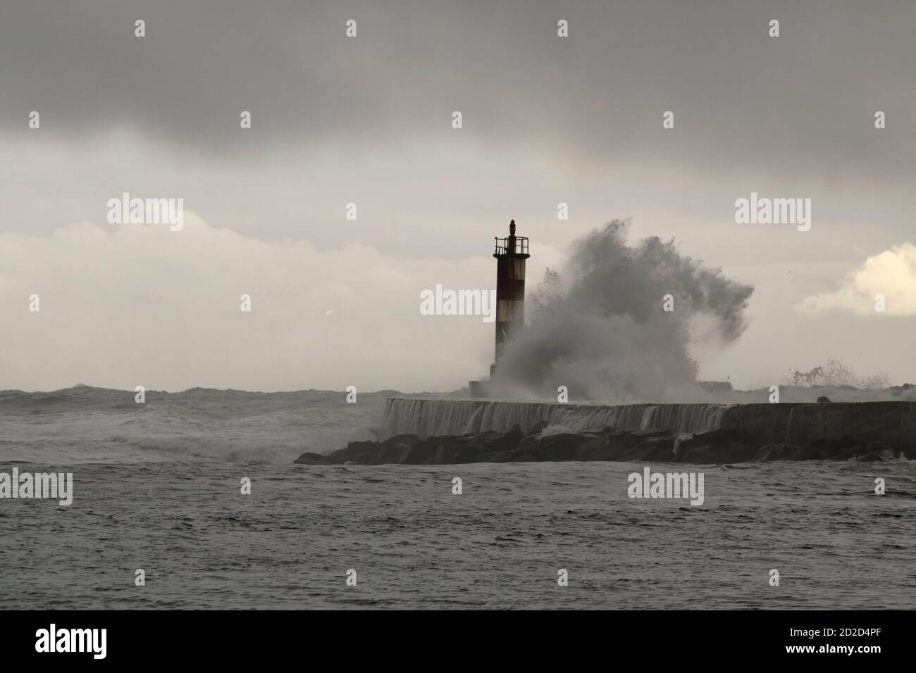 Soft backlit sea wave splash. Ave river mouth, Vila do Conde, north of ...