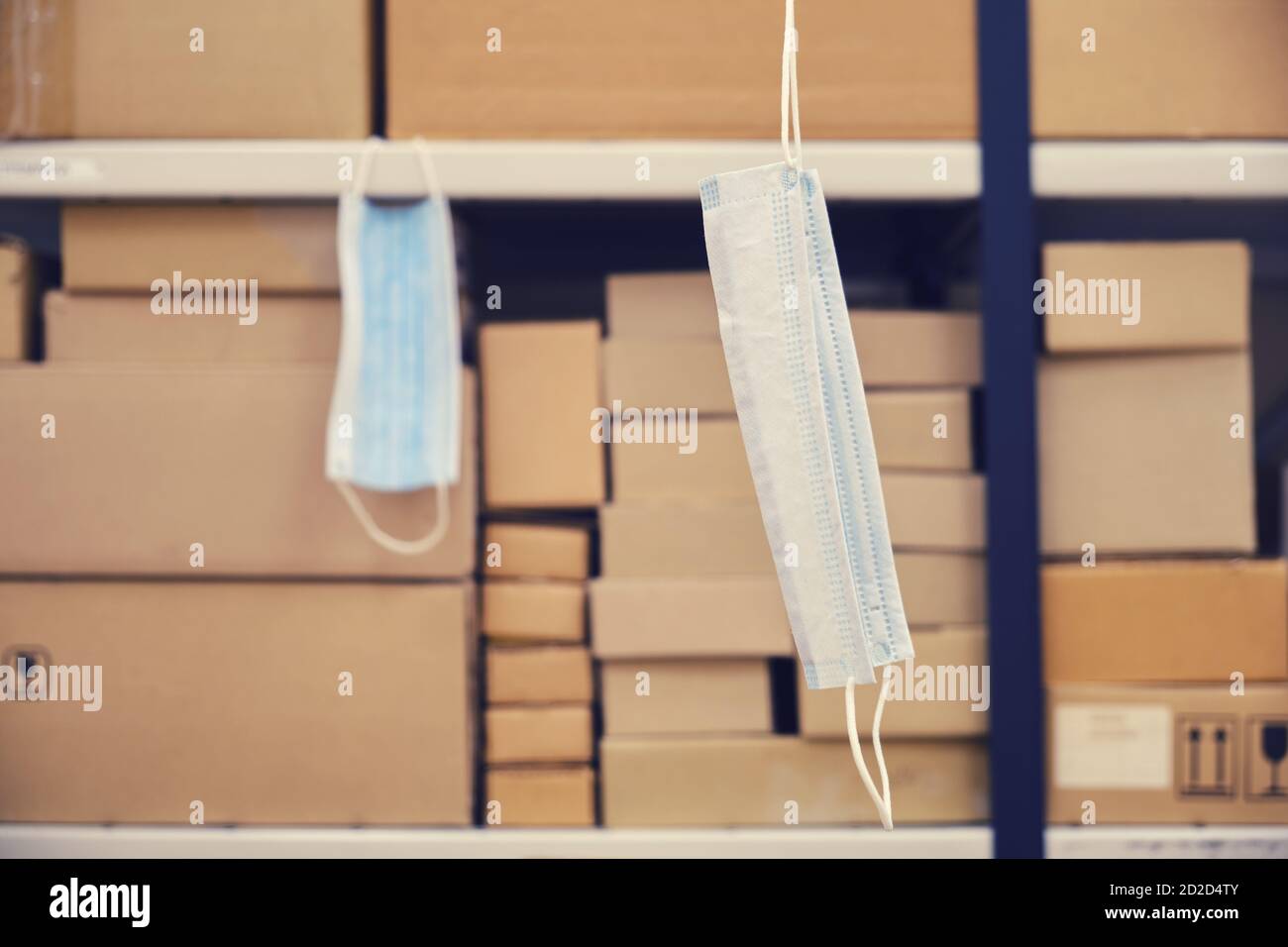 Quarantine in a warehouse with boxes due to a virus Stock Photo - Alamy