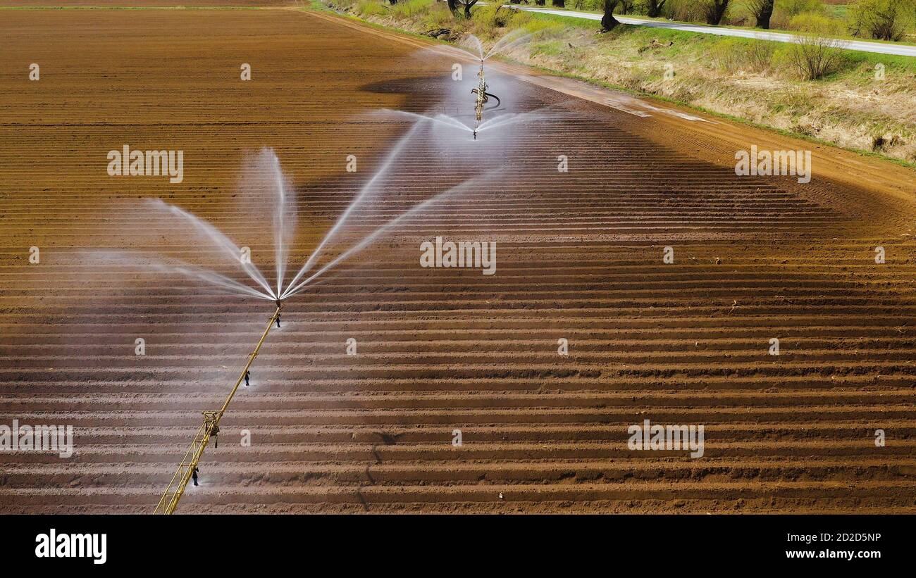 aerial view crop irrigation machine using center pivot sprinkler system ...