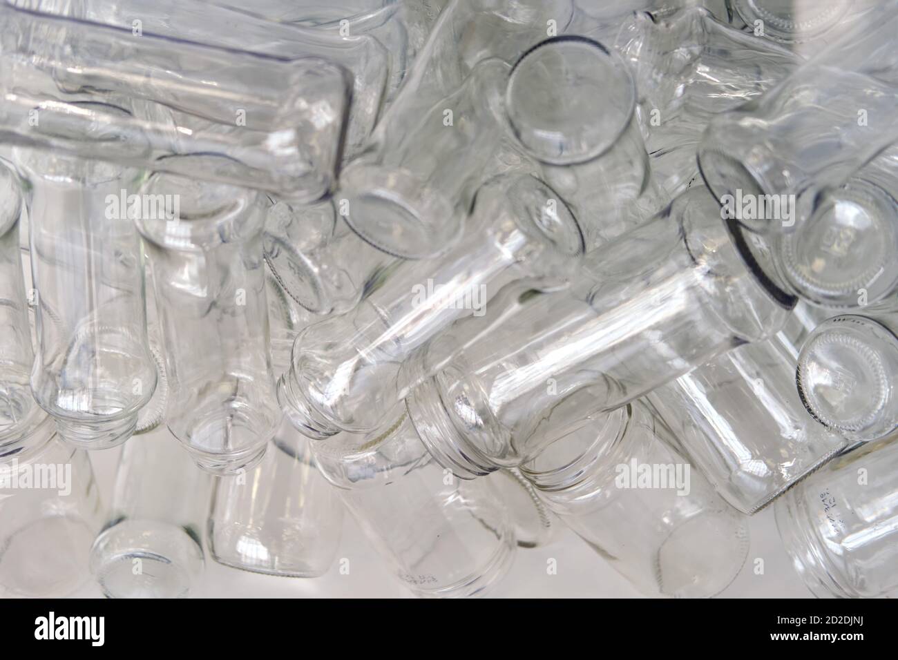 Background of empty glass bottles piled in a pile Stock Photo - Alamy