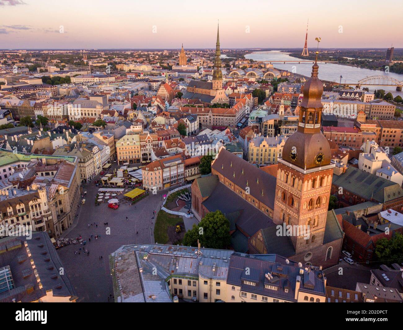 Bird's eye view of the Riga Cathedral surrounded by buildings in Latvia ...
