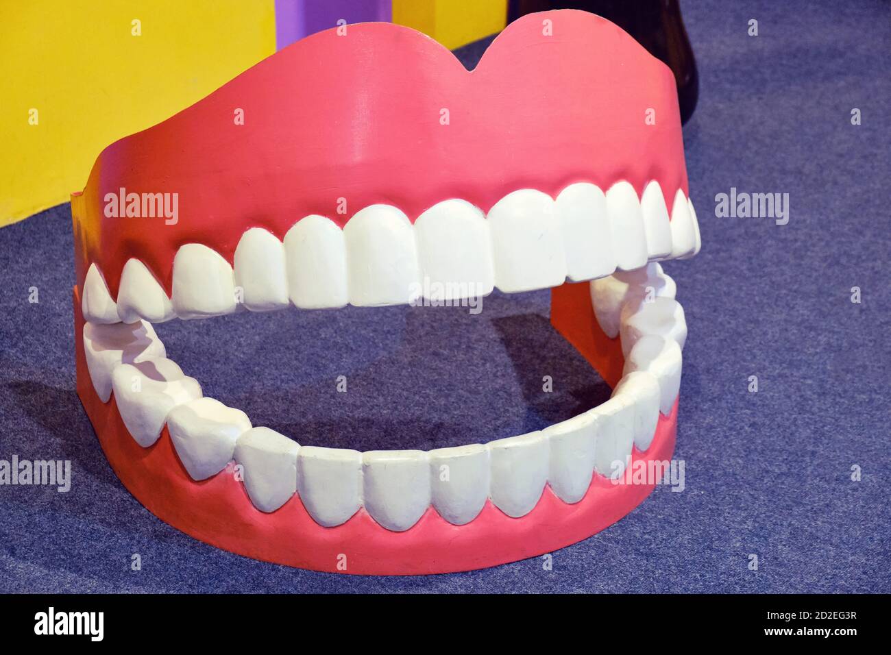 Mockup of a large false jaw of a person in a playroom Stock Photo - Alamy