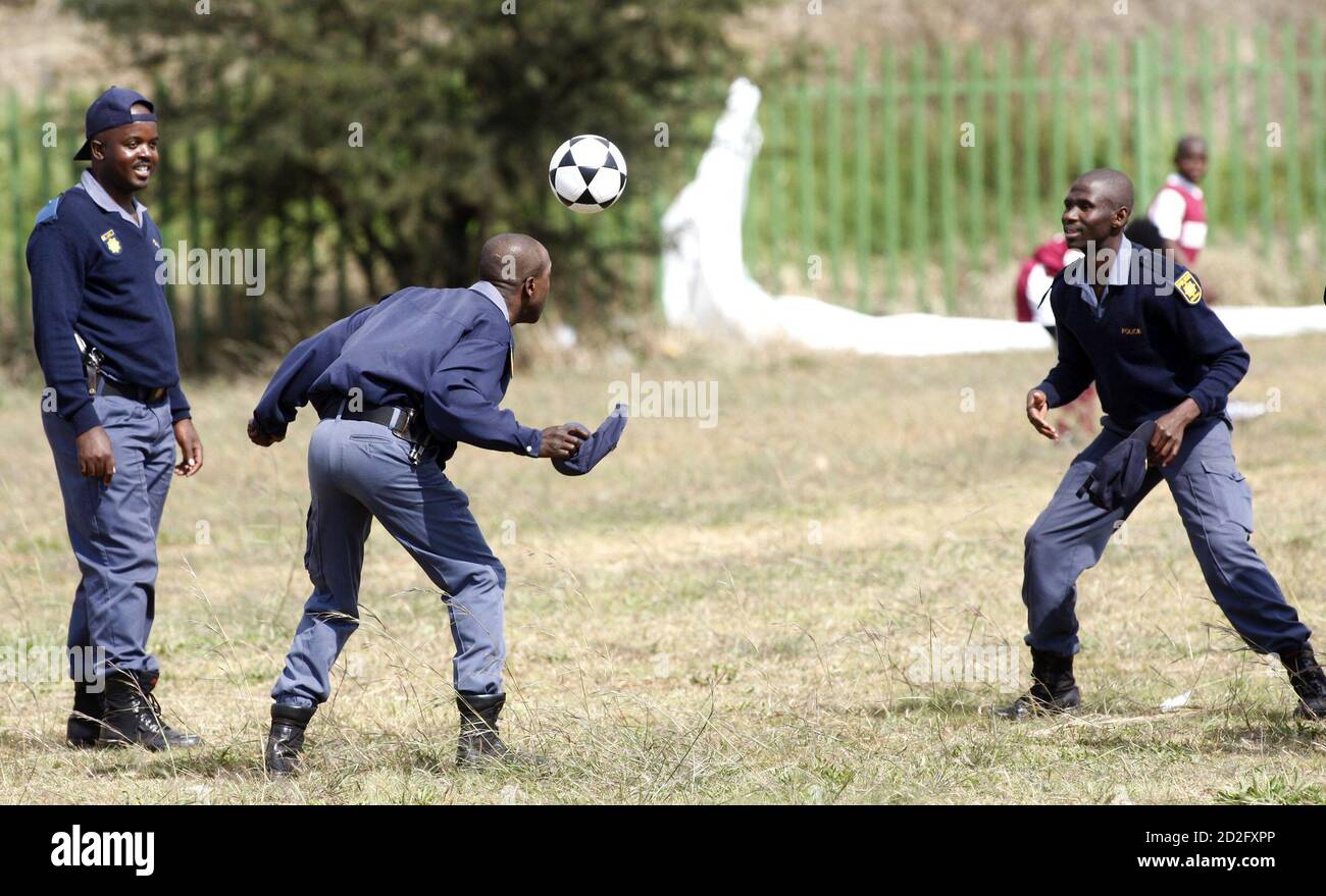 Police officers play soccer hi-res stock photography and images - Alamy