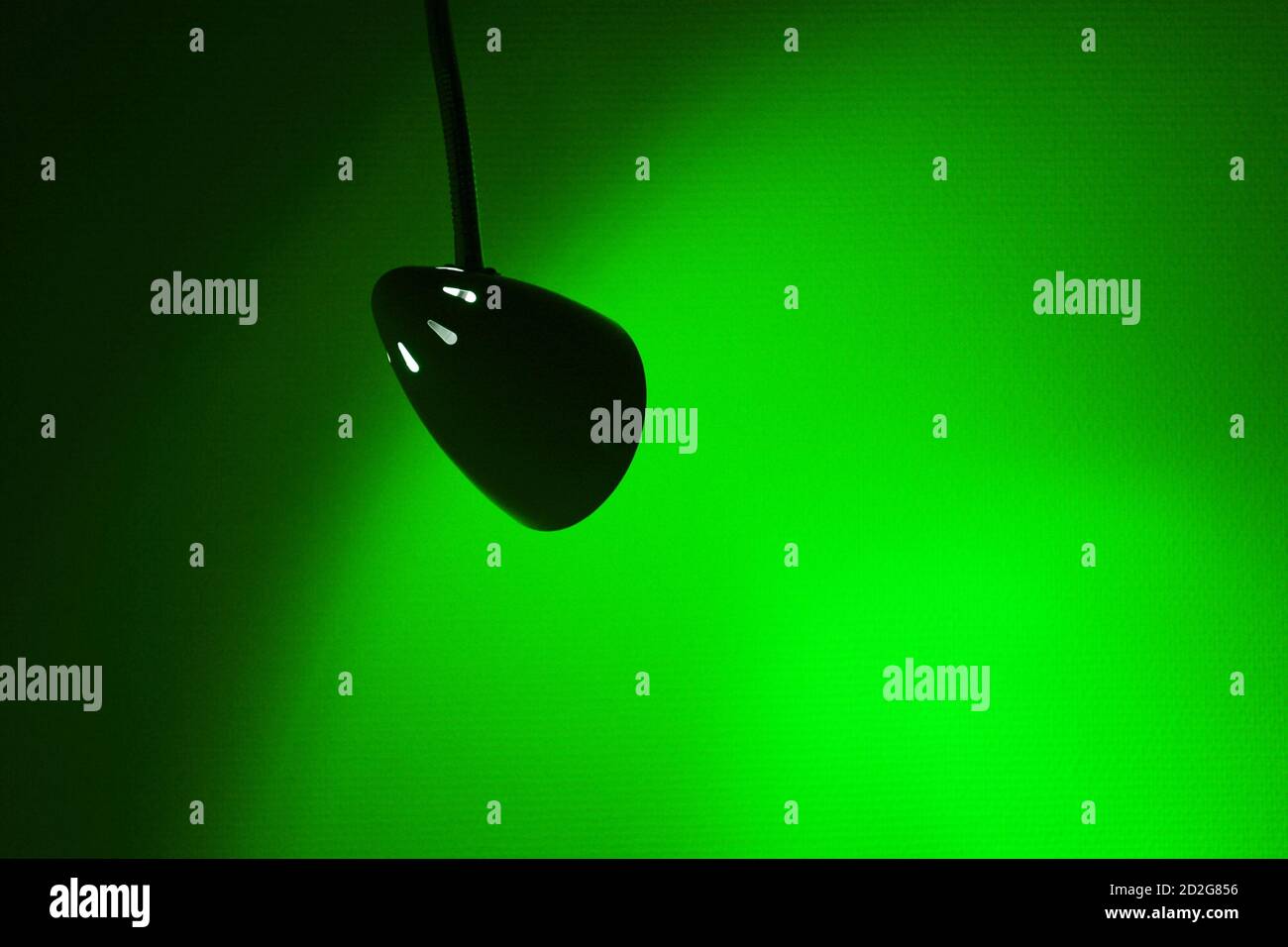 Green spot light background Stock Photo - Alamy