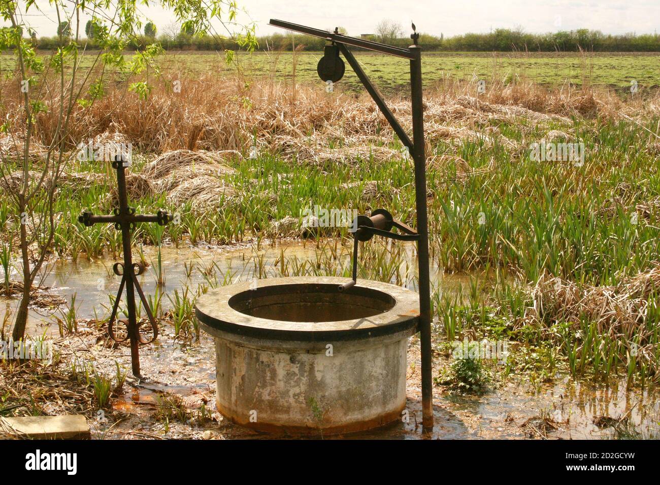 Old well in the middle of a field in Romania's countryside Stock Photo ...