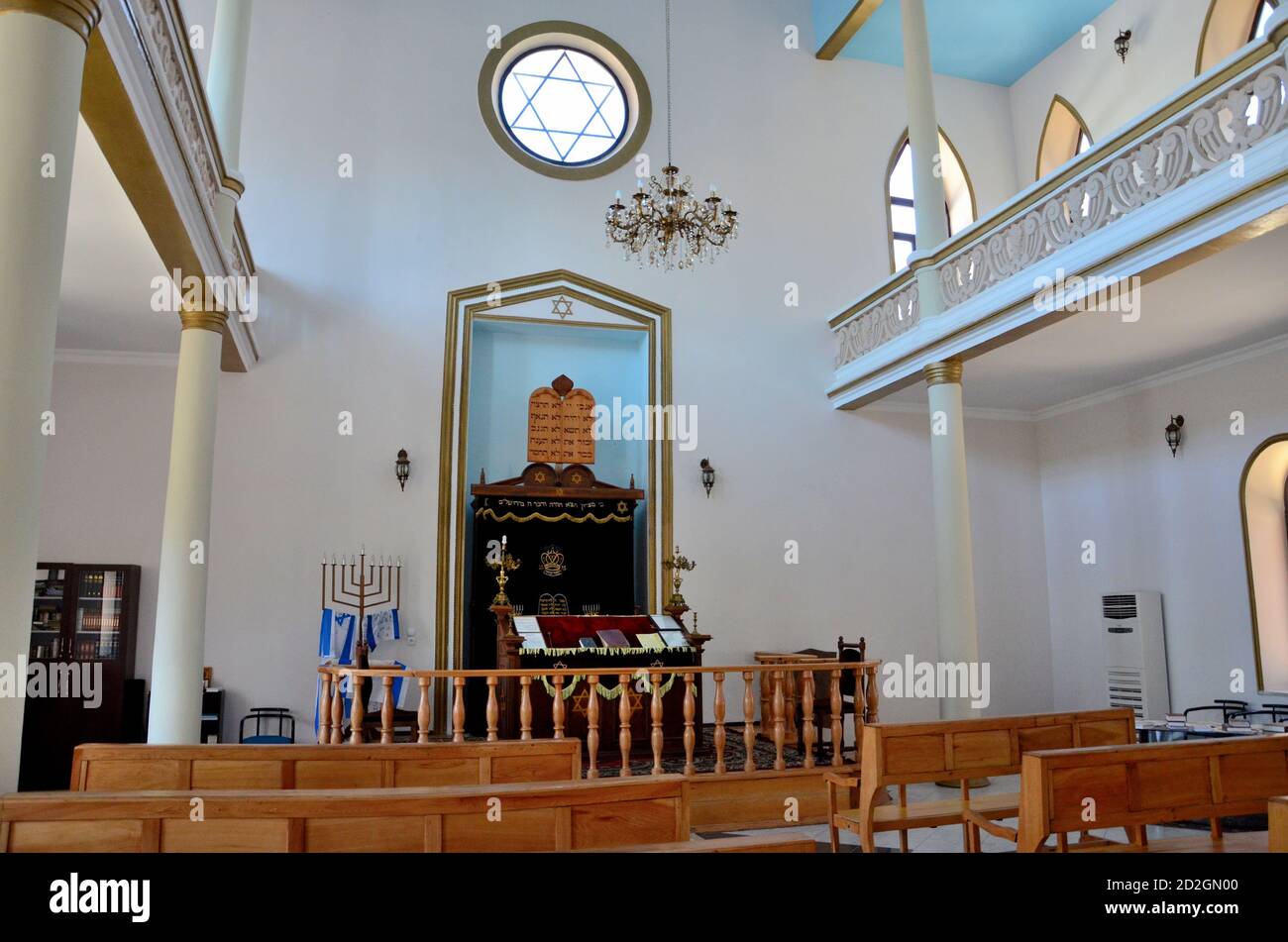 Interior of Jewish synagogue with Star of David pews altar menorah ...