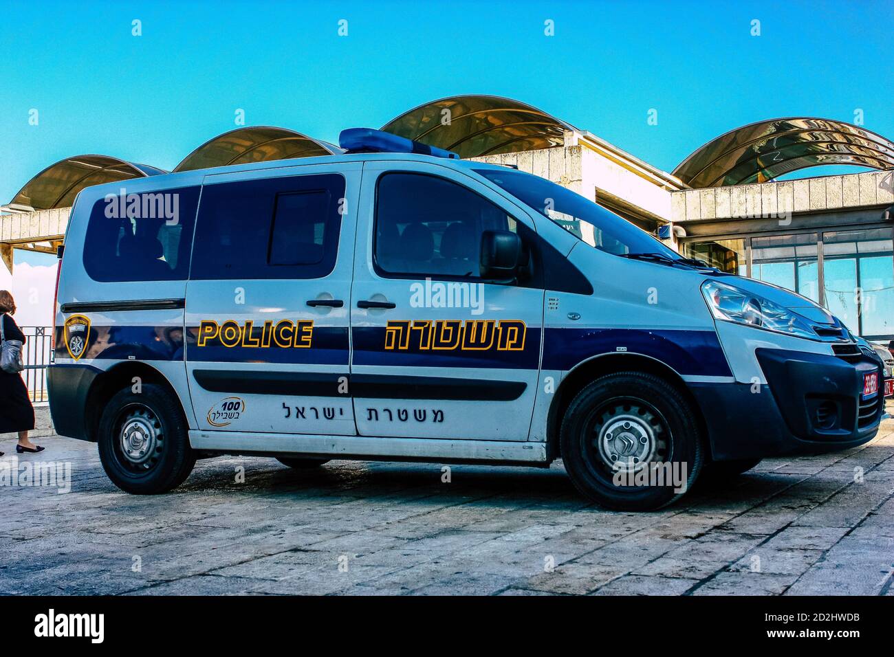 Closeup of an official police car patrolling the streets of the city ...