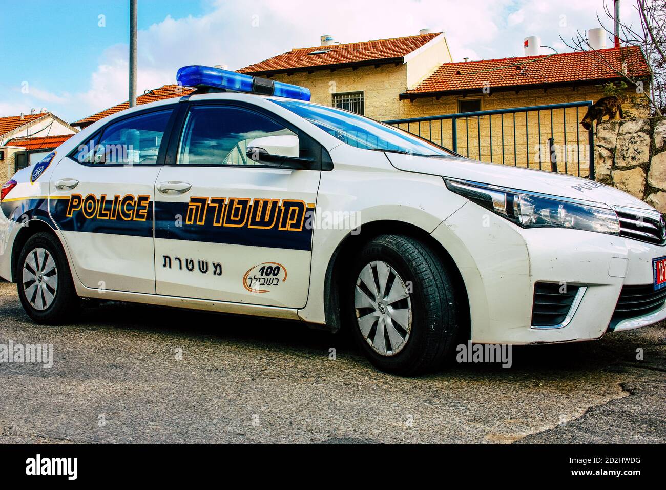 Closeup of an official police car patrolling the streets of the city ...