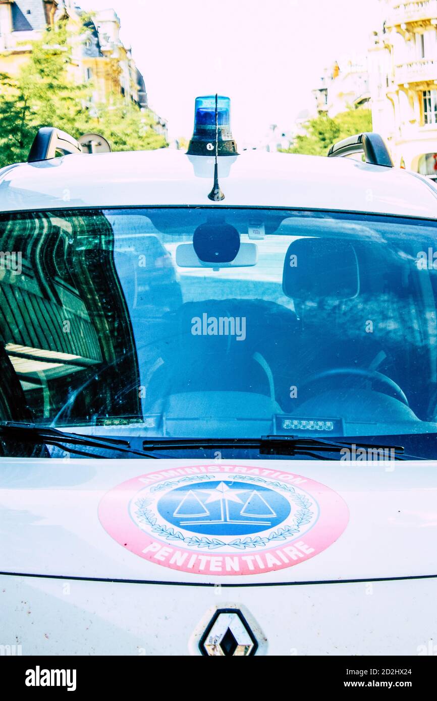 Closeup of an official police car patrolling the streets of the city ...