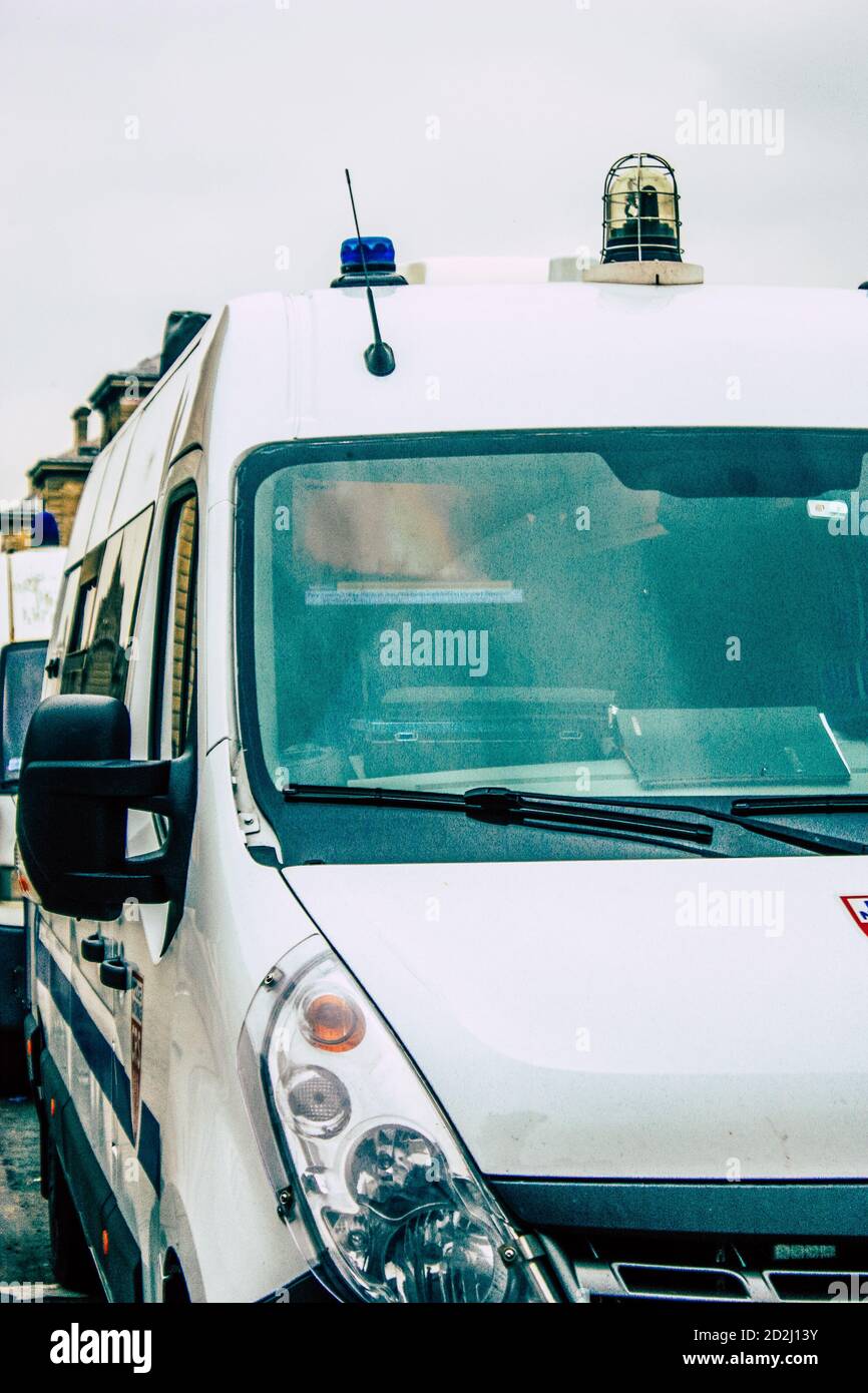 Closeup of an official police car patrolling the streets of the city ...