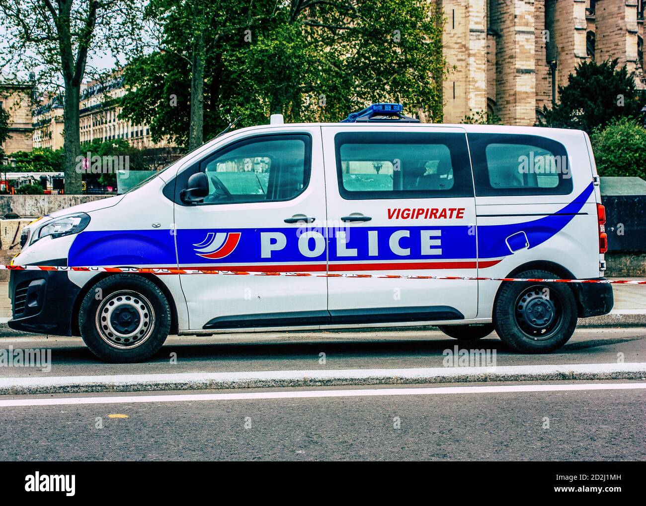 Closeup of an official police car patrolling the streets of the city ...