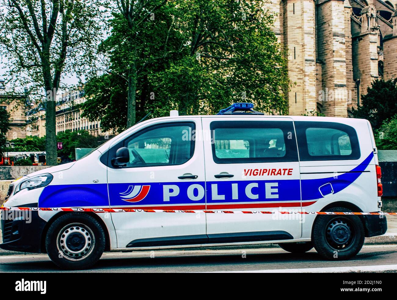 Closeup of an official police car patrolling the streets of the city ...