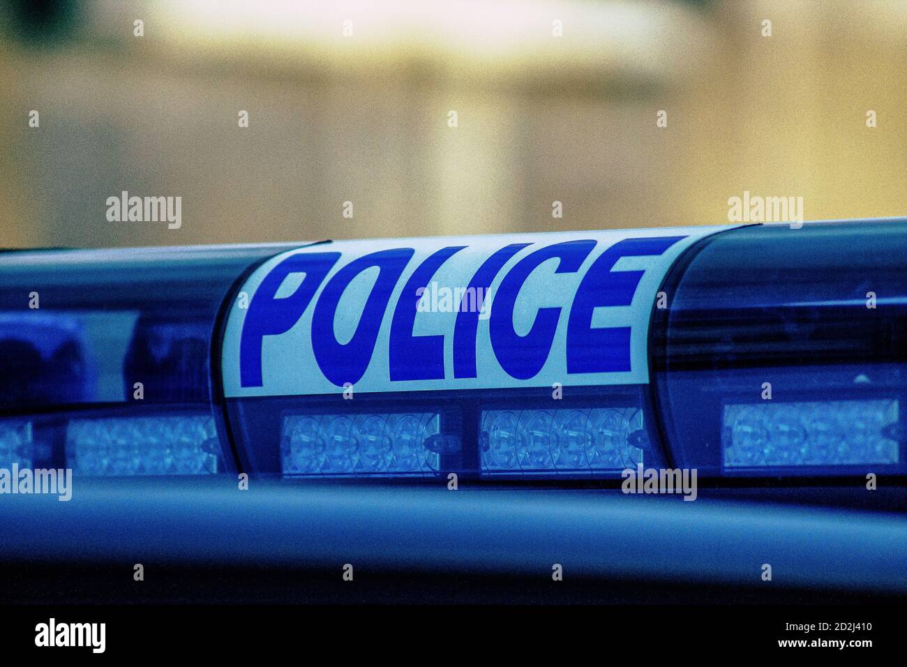 Closeup of an official police car patrolling the streets of the city ...